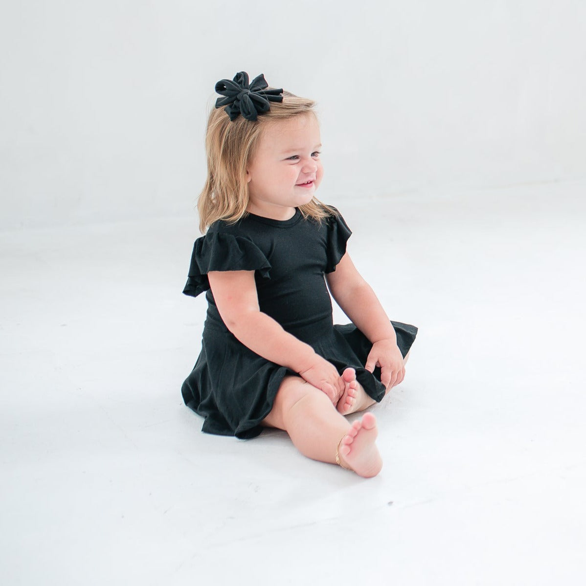 Black Cap Sleeve Twirl Dress – Sweet Peas Co